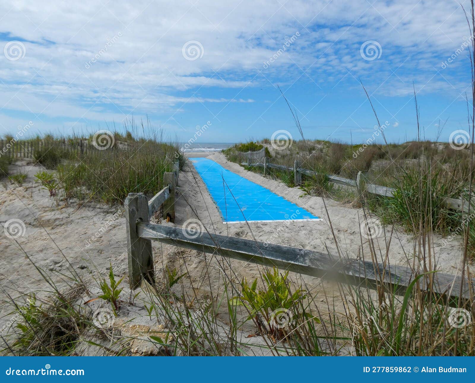 Blue Mat on Sand Path To Beach between Sand Dunes Stock Photo - Image ...
