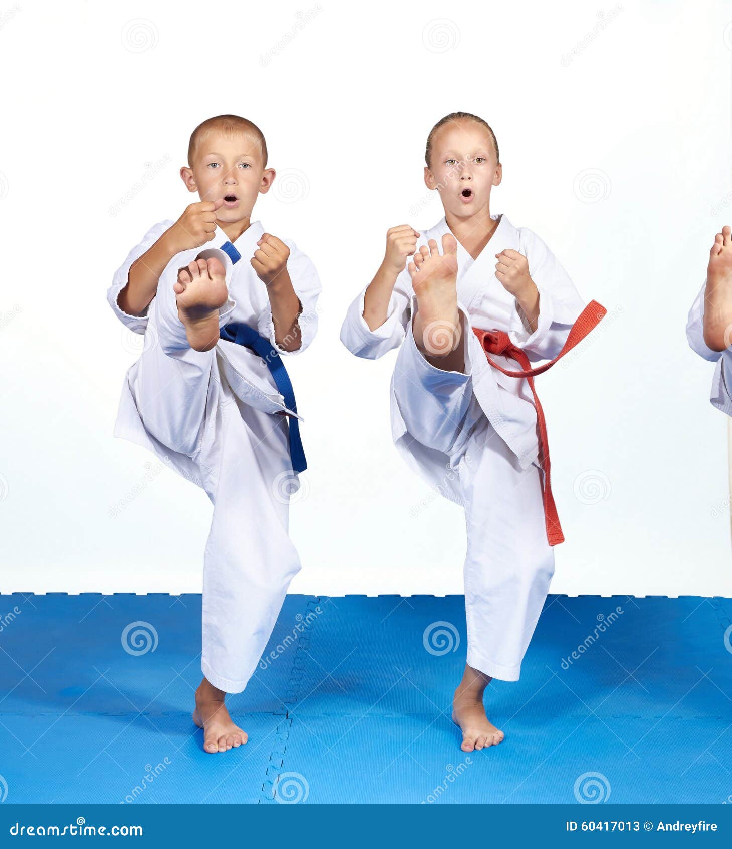 On the Blue Mats Two Athletes Beat Strike Mae-geri Stock Image - Image ...