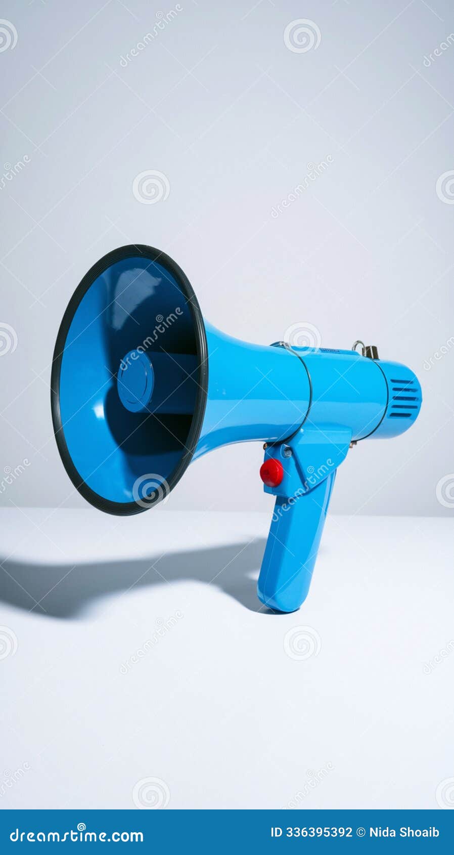 Blue Megaphone Side Profile Against White Background, Subtle Shadow ...
