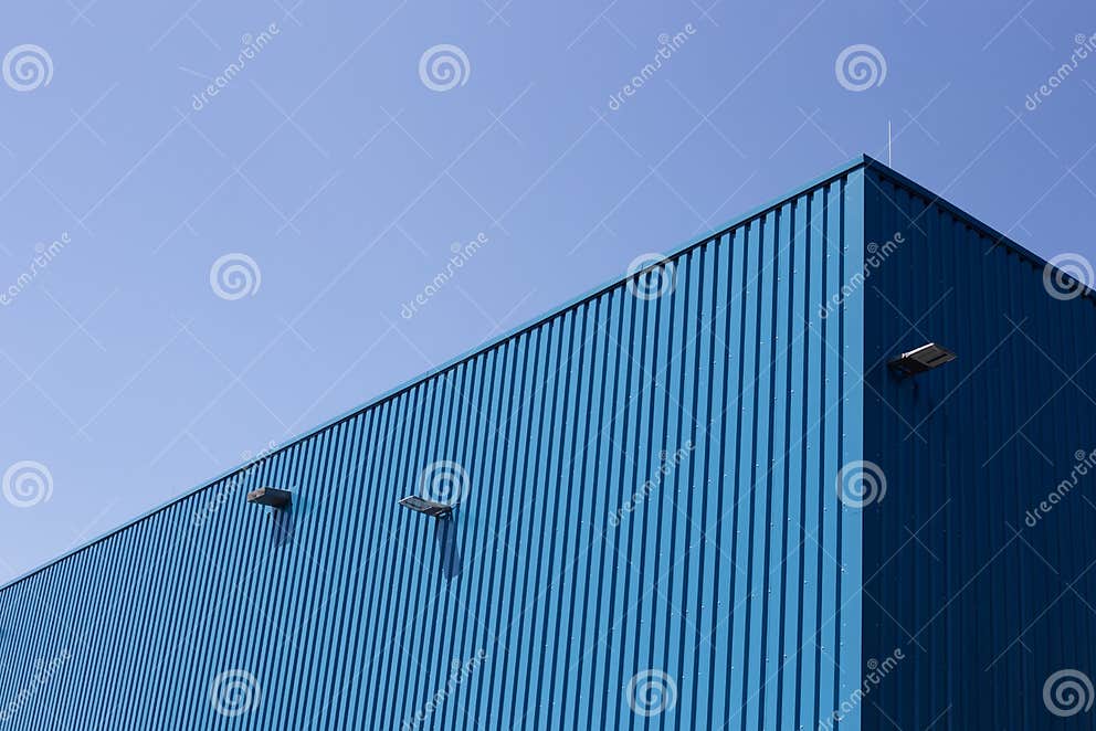 Blue Metal Building on Sky Background Stock Image - Image of wall ...