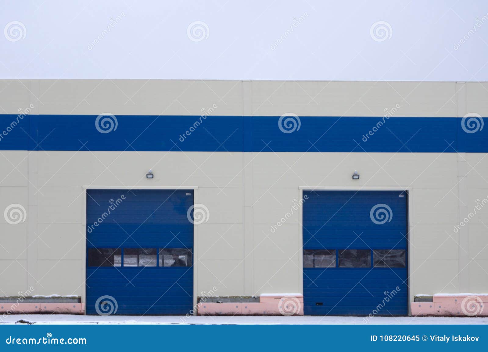 Blue Metal Gates and Doors Beige Wall . Stock Image - Image of ...
