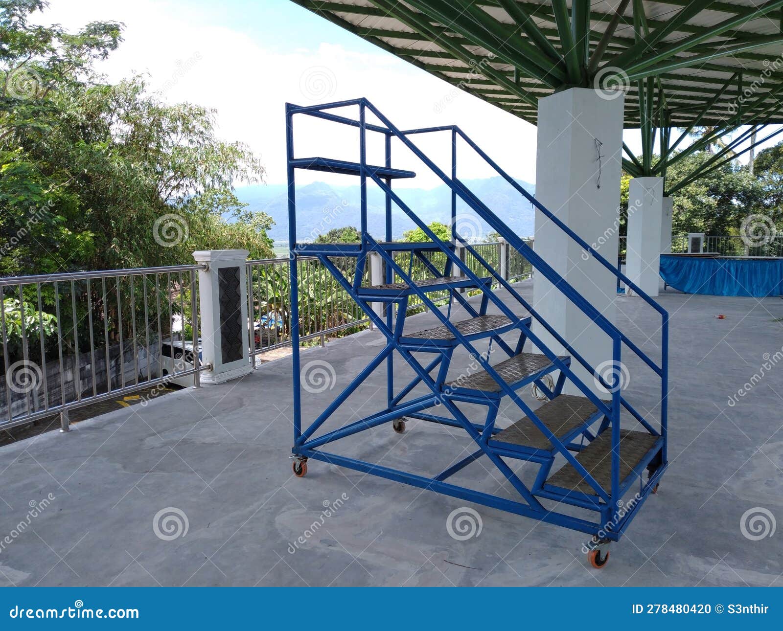 Blue Metal Pushable Ladder in a Building Project Stock Photo - Image of ...