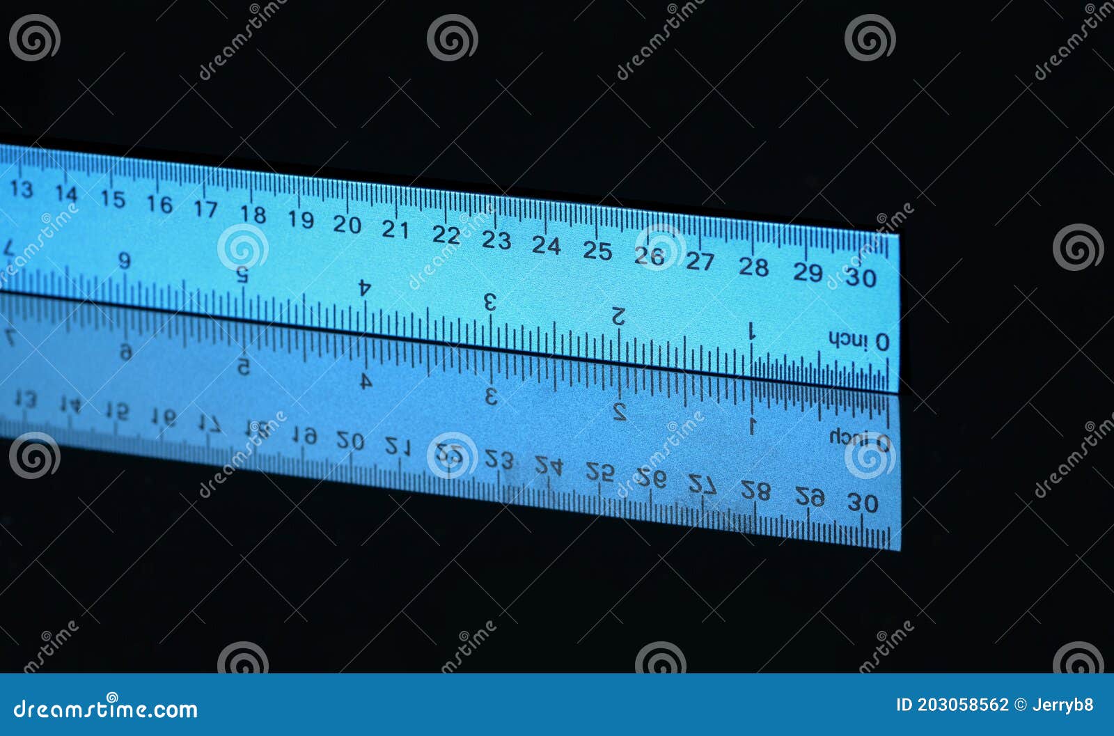 Blue Metal Ruler Black Reflective Tabletop Stock Photo - Image of ...
