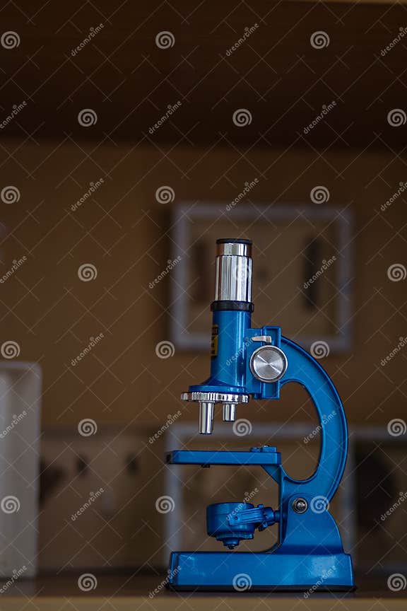 Blue Microscope Stands on a Shelf of a Training Cabinet Stock Image ...