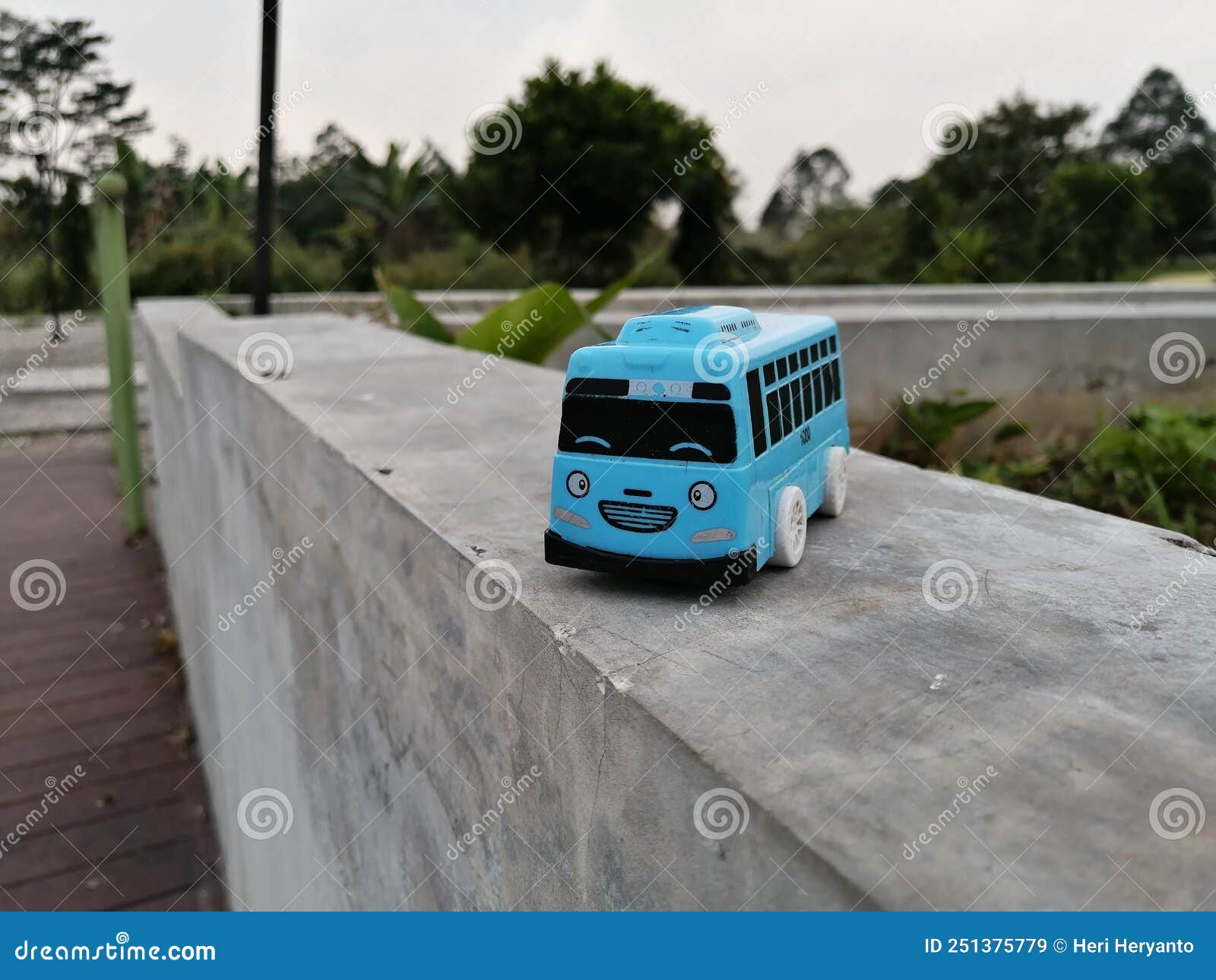 A blue mini bus toy stock image. Image of vehicle, track - 251375779