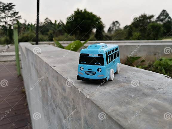 A blue mini bus toy stock image. Image of vehicle, track - 251375779