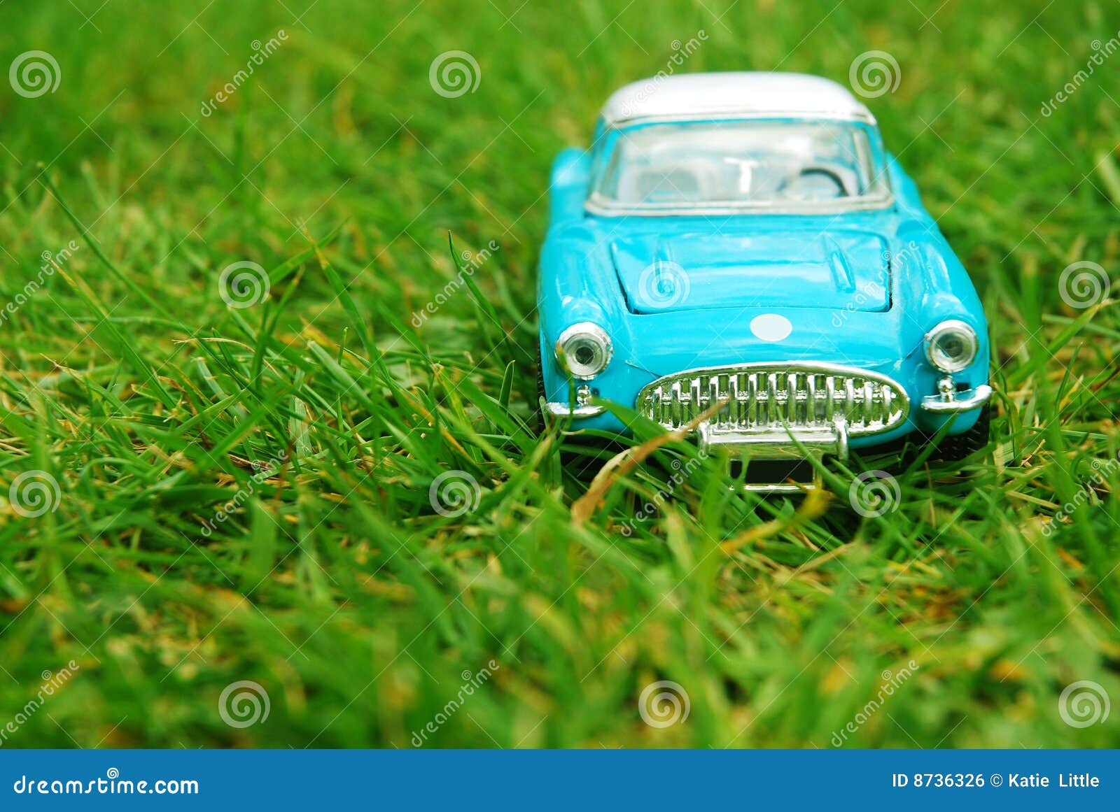 Blue Miniature Car on Grass Stock Photo - Image of model, children: 8736326