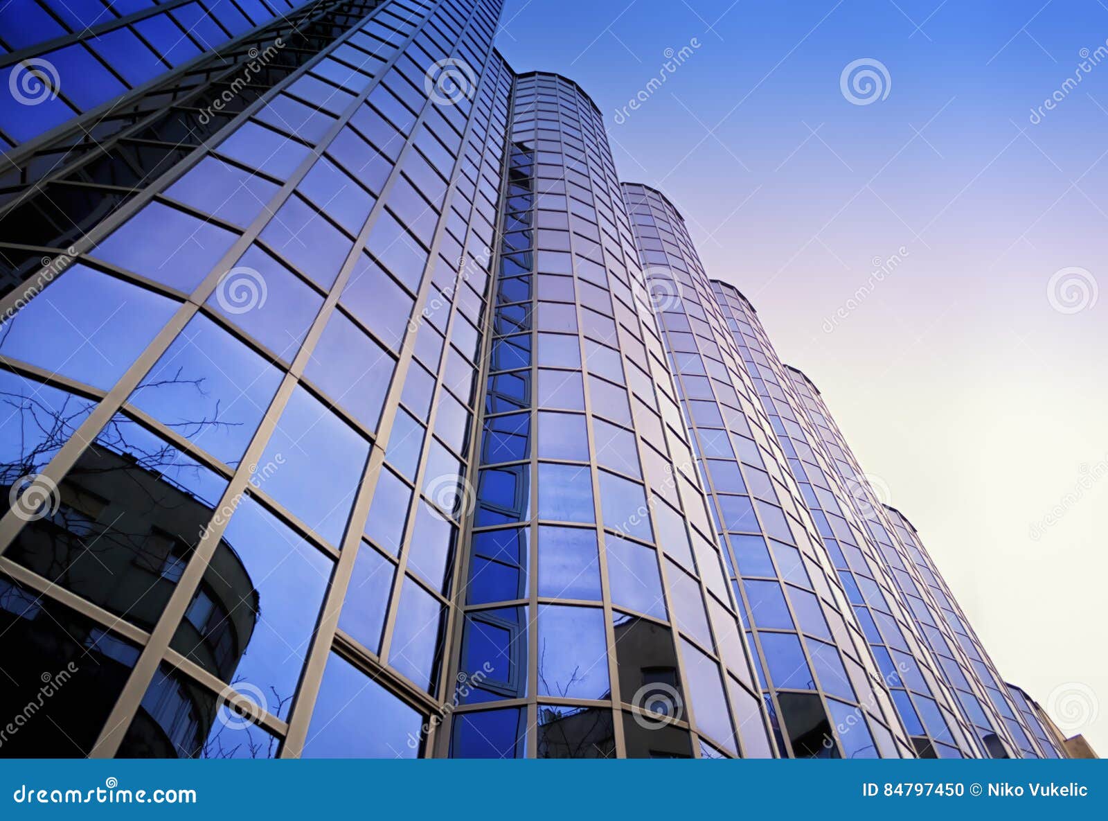 Blue mirror glass facade stock photo. Image of building - 84797450