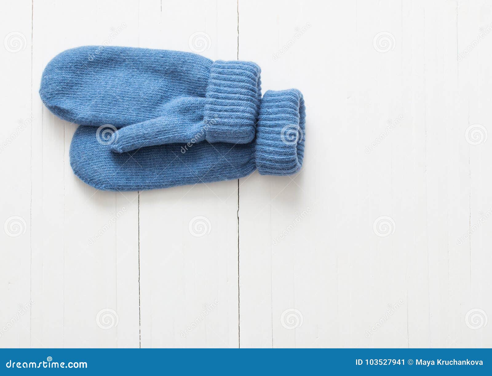 Blue Mittens on White Wooden Background Stock Image - Image of fluffy ...