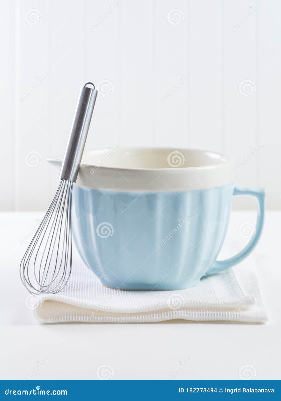 Blue Mixing Bowl With Wisp For Baking On White Background Stock Photo ...
