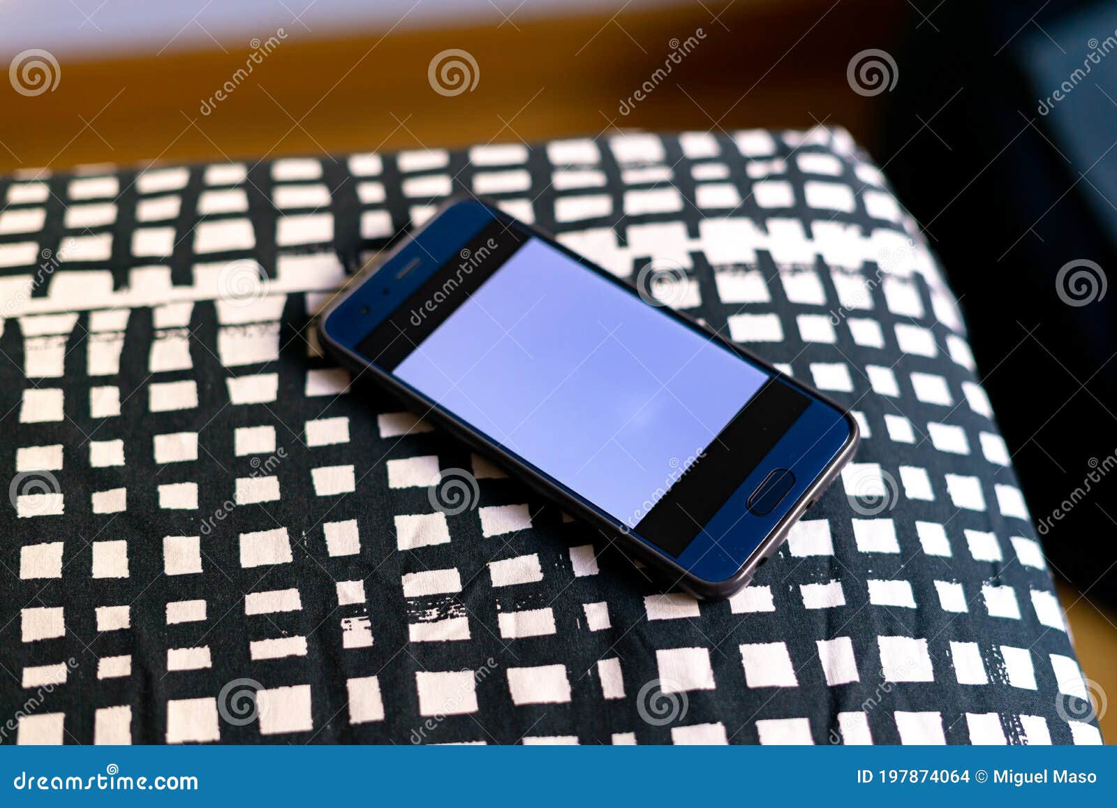 A blue mobile phone on stock photo. Image of advertise - 197874064