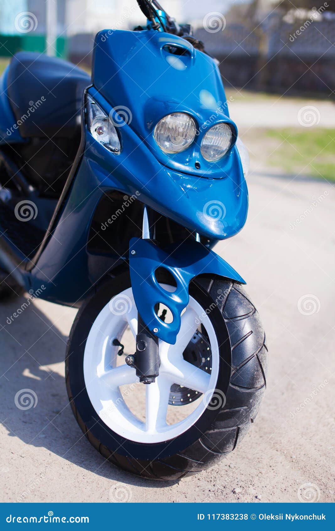 Blue Modern Scooter on the Gravel Road Front View Stock Photo - Image ...