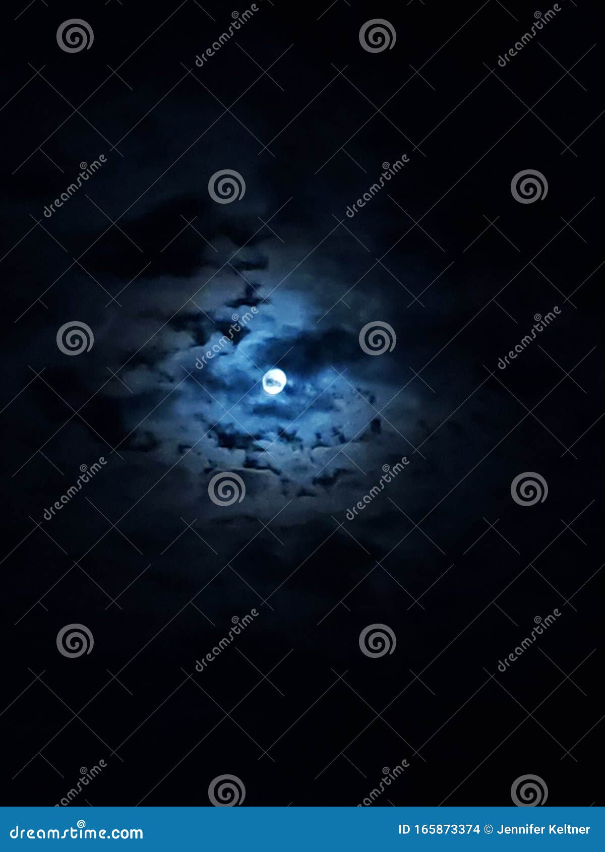 Blue Moon on a Cloudy Cold Night Stock Photo - Image of cold, cloudy ...