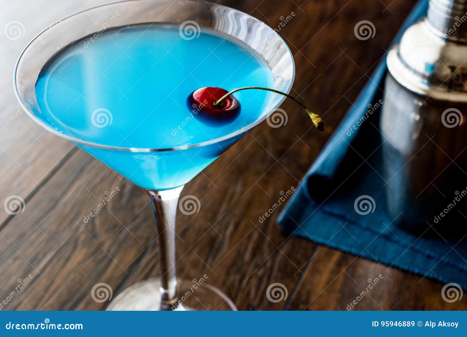 Blue Moon Cocktail with Cherry on Wooden Surface. Stock Image - Image ...