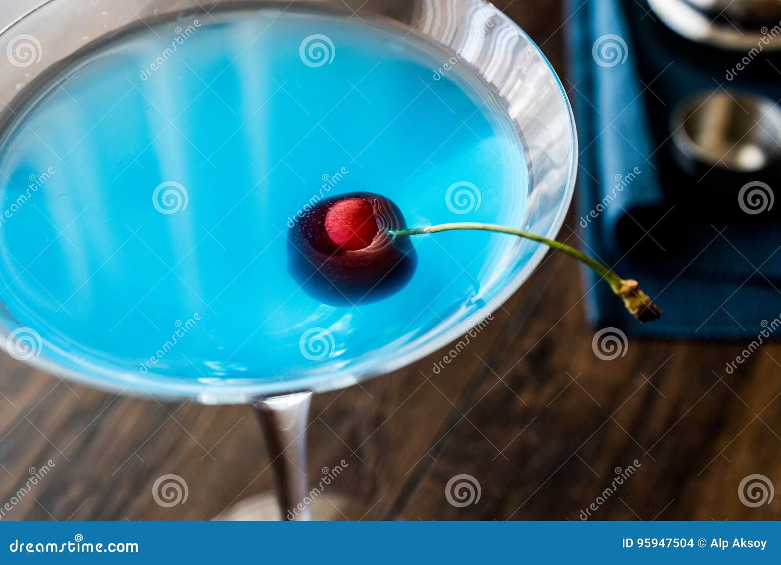 Blue Moon Cocktail with Cherry on Wooden Surface. Stock Photo - Image ...