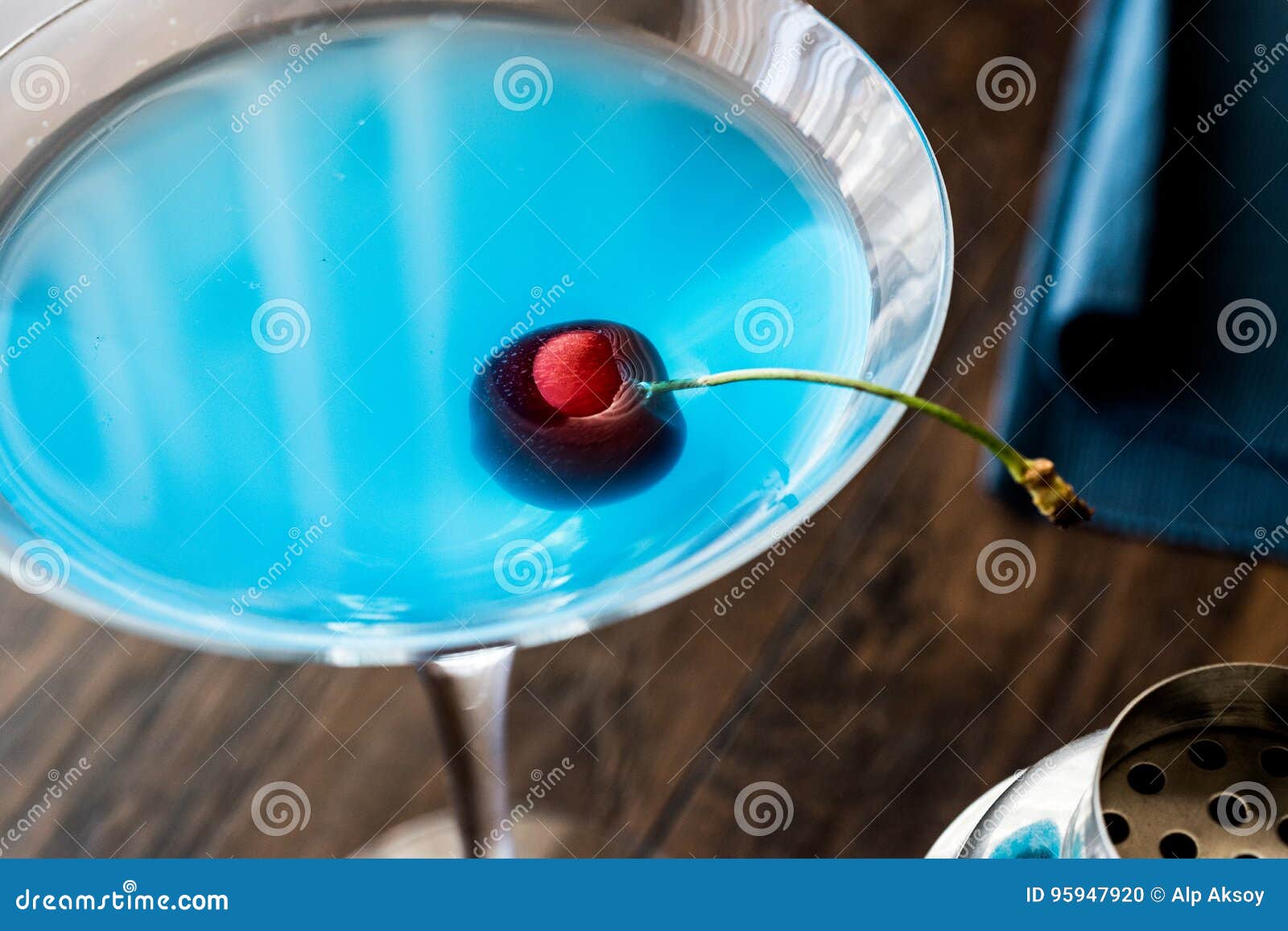 Blue Moon Cocktail with Cherry on Wooden Surface. Stock Photo - Image ...