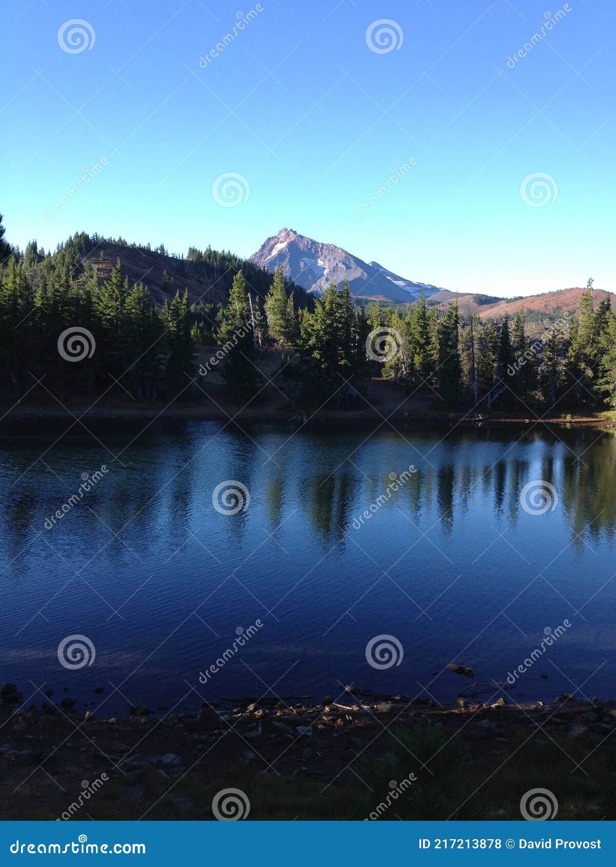 Blue mountain lake stock photo. Image of blue, oregon - 217213878