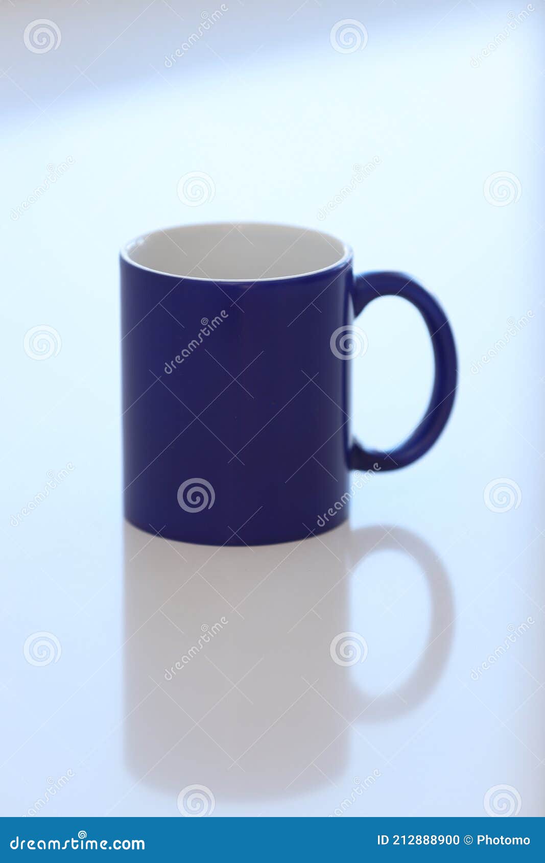 Blue mug with a reflection stock photo. Image of cafe - 212888900
