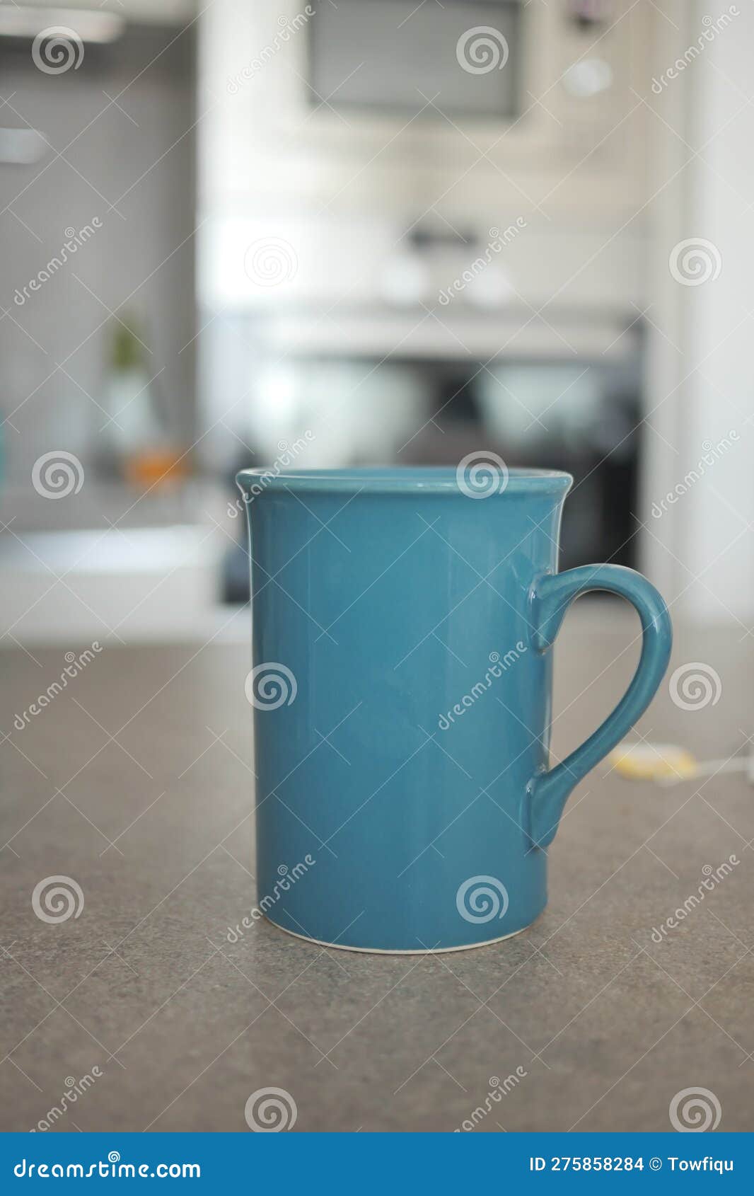Blue Mug on Table with Kitchen Background. Stock Photo - Image of ...