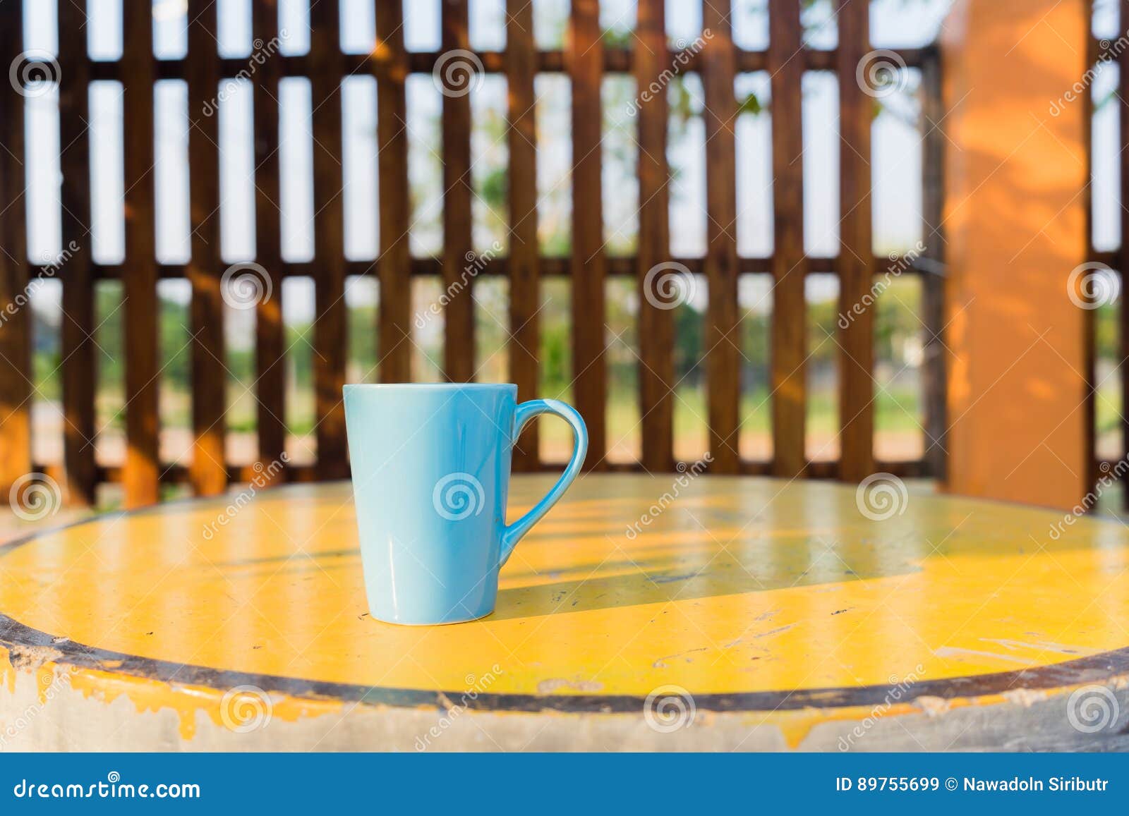 Blue Mug on Yellow Table, Coffee Cup Front View Stock Image - Image of ...