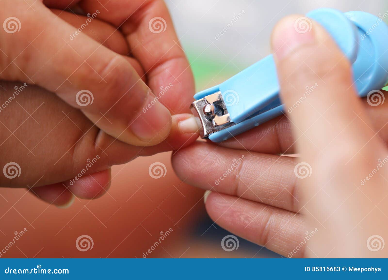 Blue Nail clipper. stock image. Image of finger, closeup - 85816683