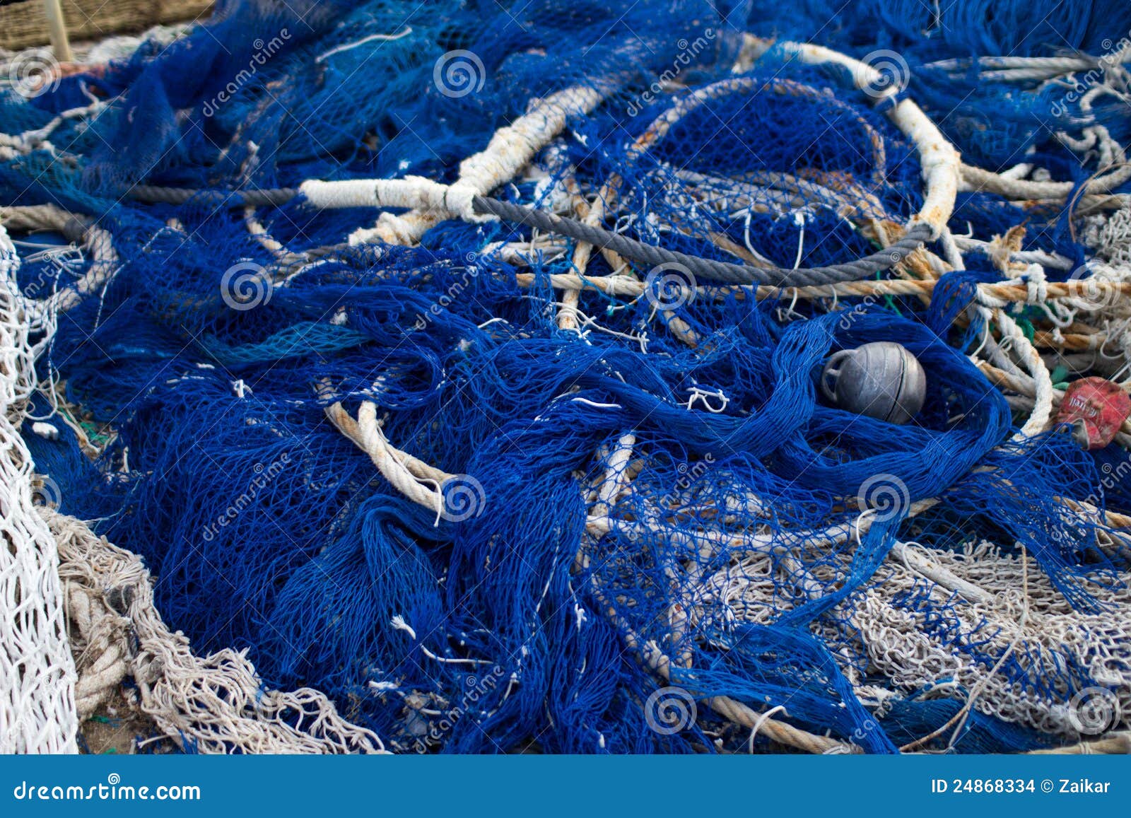 Blue net stock photo. Image of fisherman, ocean, fishingnet - 24868334
