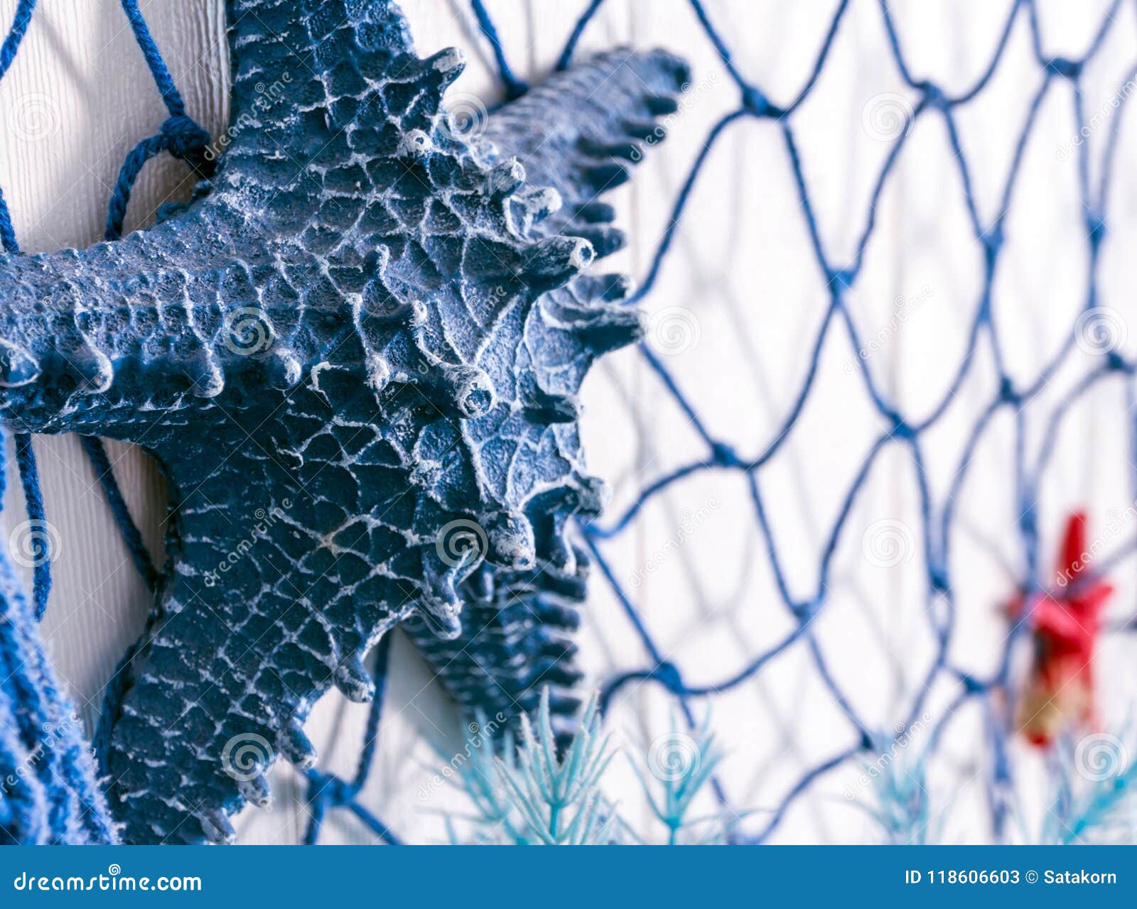 Blue Net and Artificial Starfish Made of Plastic on the Wall Dec Stock ...