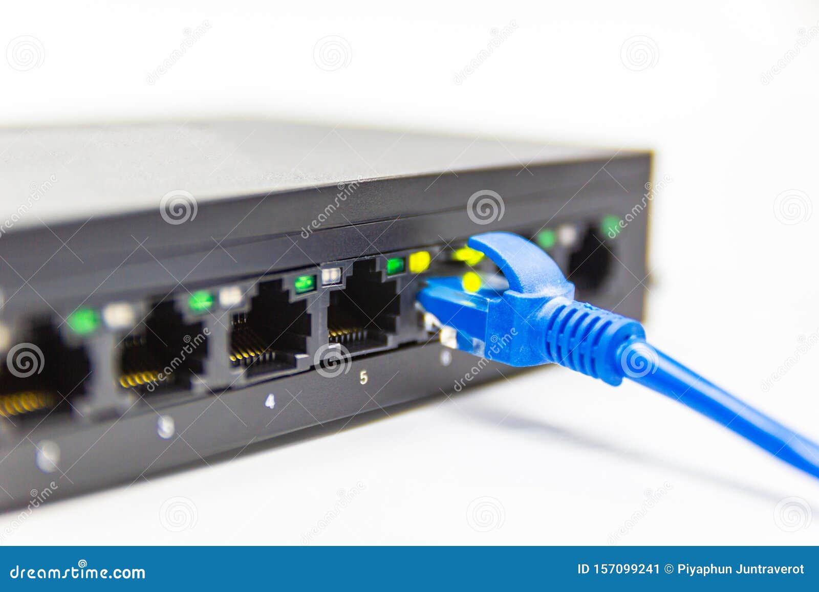 The Blue Network Cables Connect Port Switch on White Table Stock Image ...