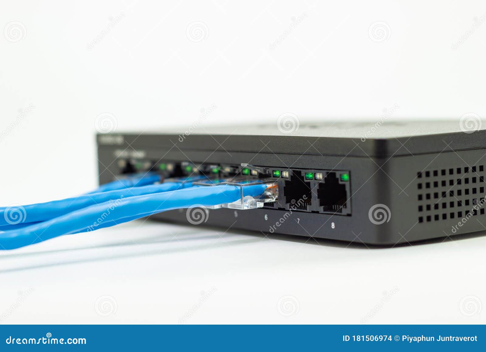 The Blue Network Cables Connect Port Switch on White Table Concept ...