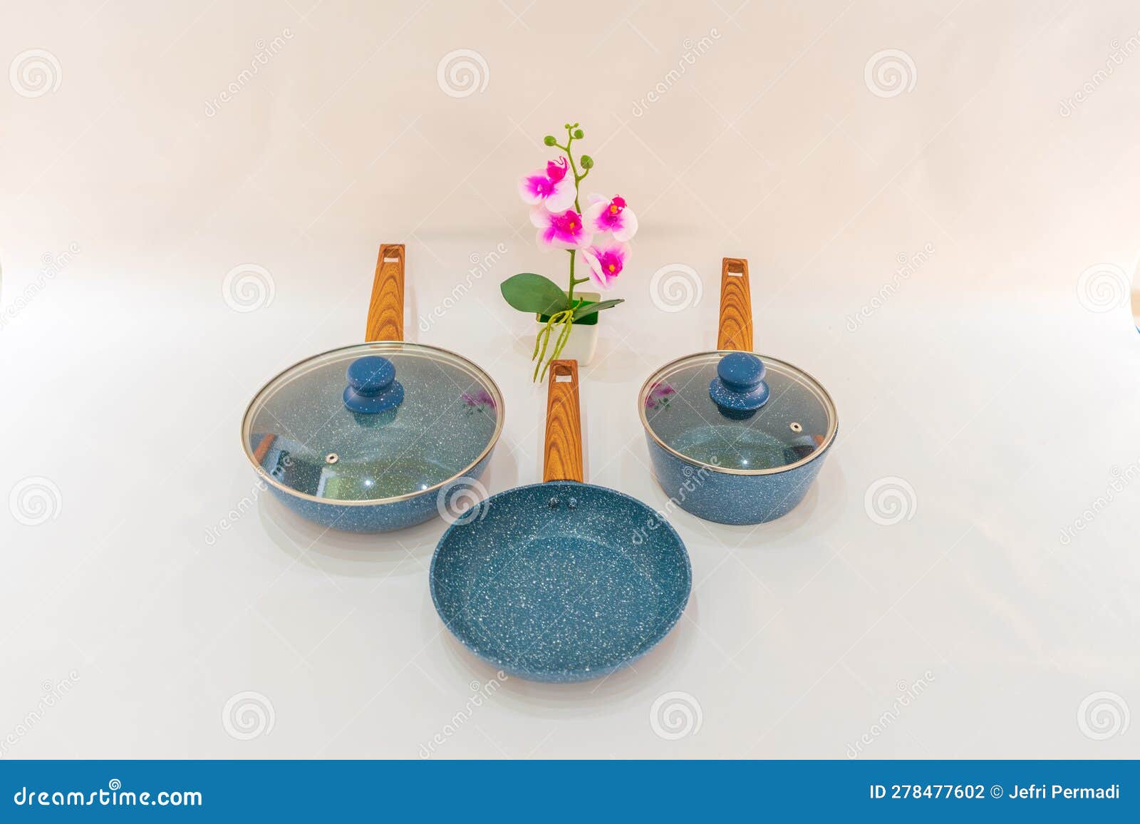 Blue Non-Stick Pot and Teflon Pan with Wooden Handle Stock Photo ...