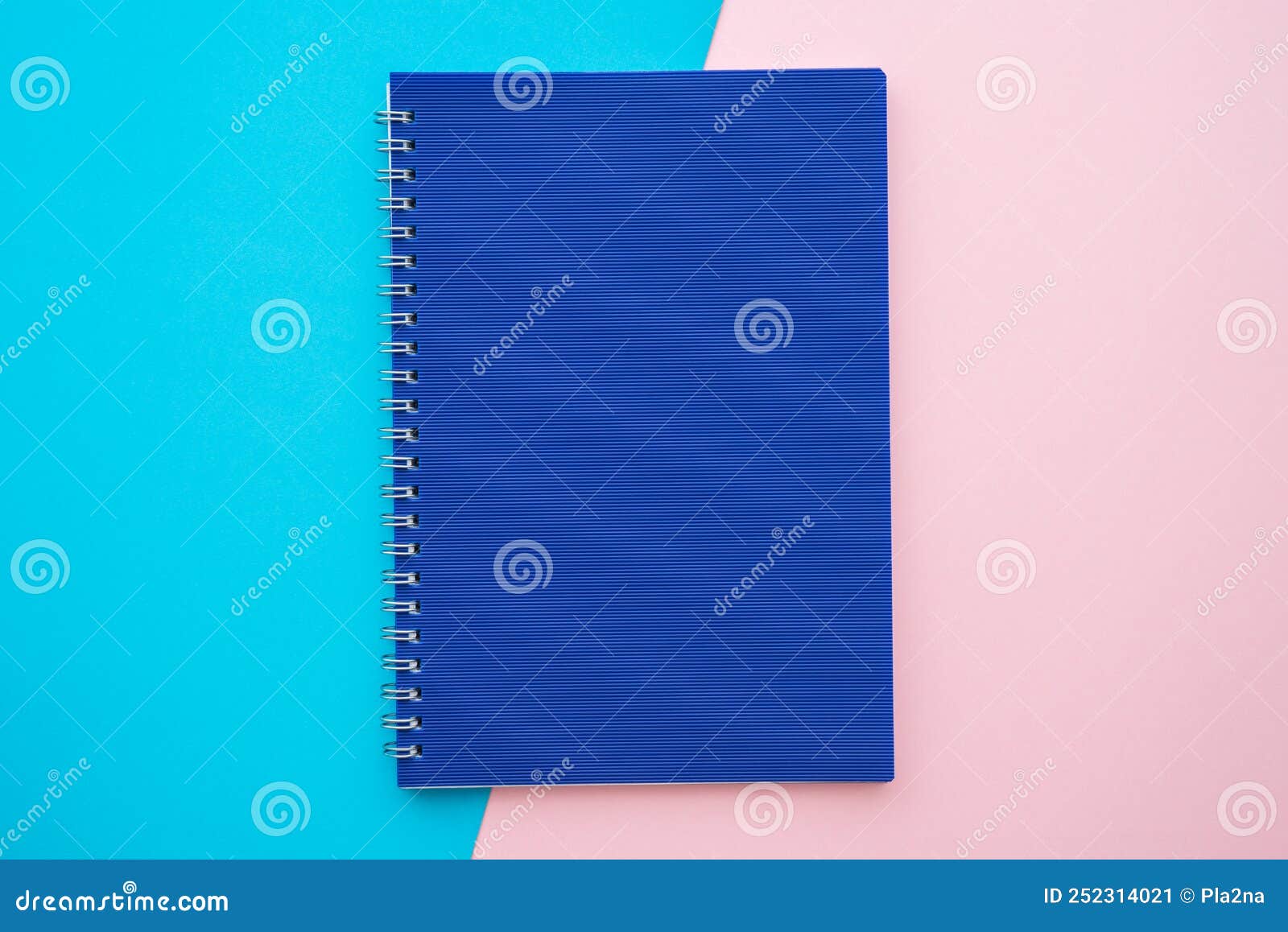 Blue Notepad on Pink Blue Background - Business Education Stationery ...