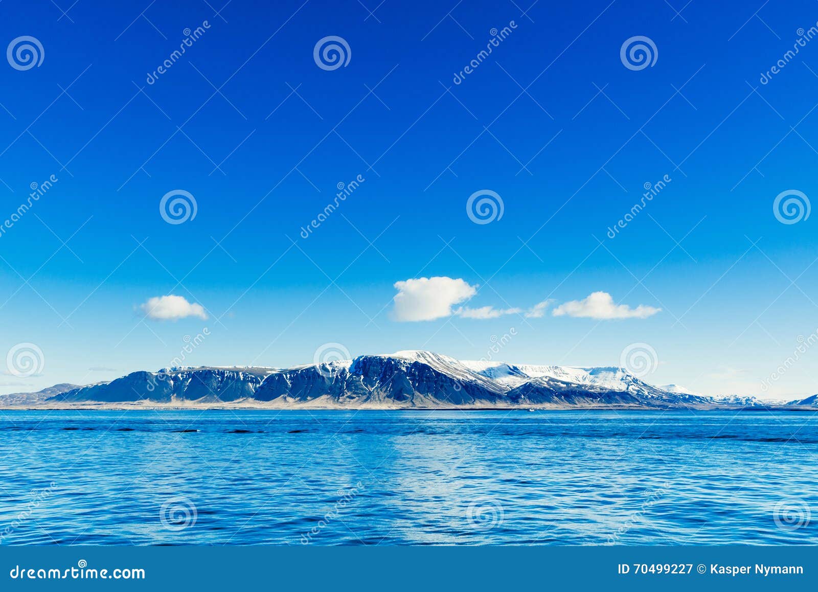 Blue Ocean with Distant Mountains Stock Image - Image of mountain ...