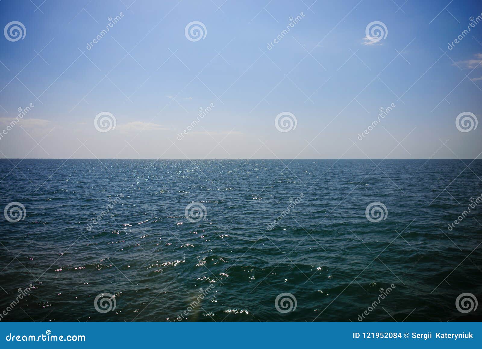 The Blue Ocean with Dull Clouds on a Lovely Sunny Day Stock Photo ...