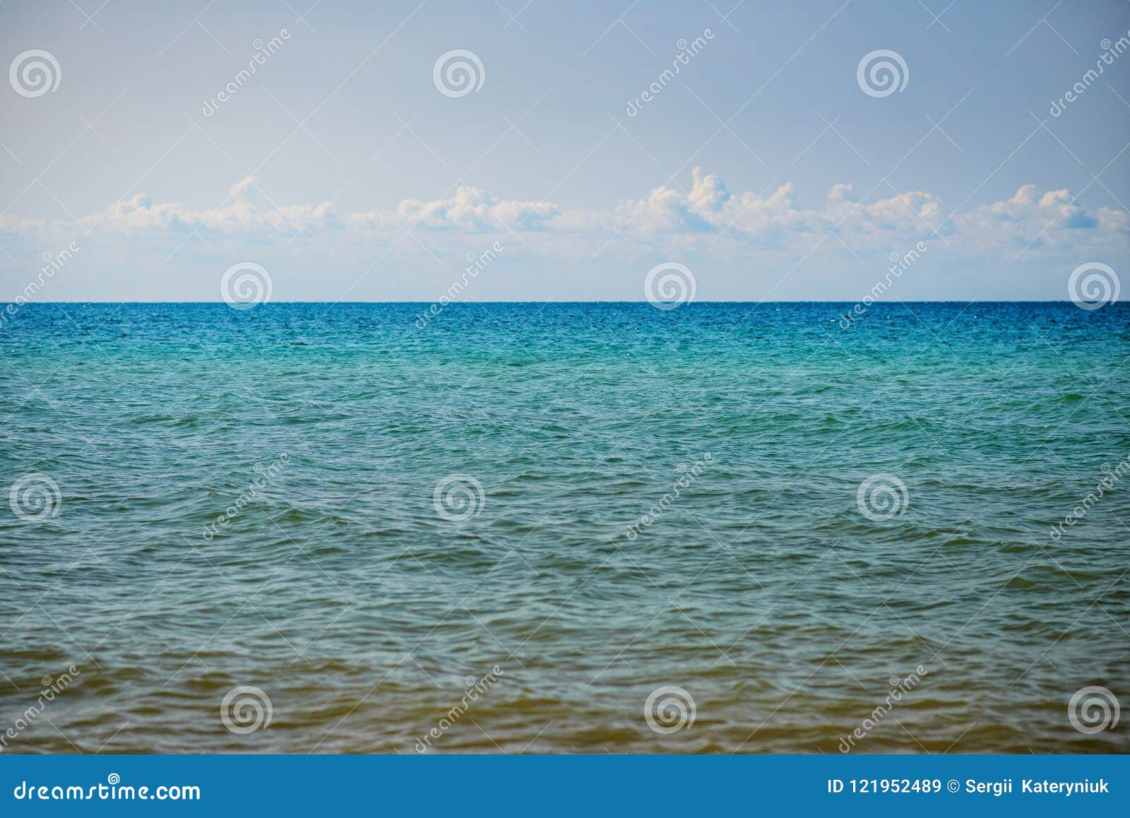 The Blue Ocean with Dull Clouds on a Lovely Sunny Day Stock Image ...