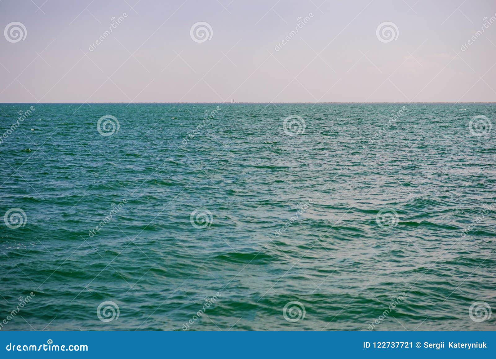 The Blue Ocean with Dull Clouds on a Lovely Sunny Day Stock Image ...