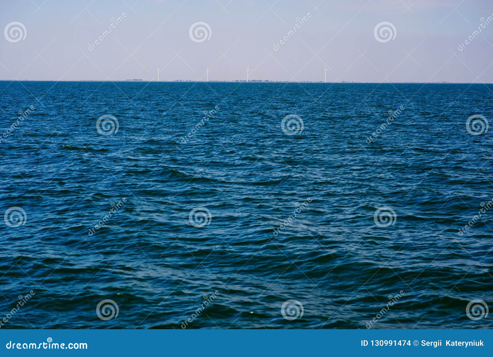 The Blue Ocean with Dull Clouds on a Lovely Sunny Day Stock Photo ...