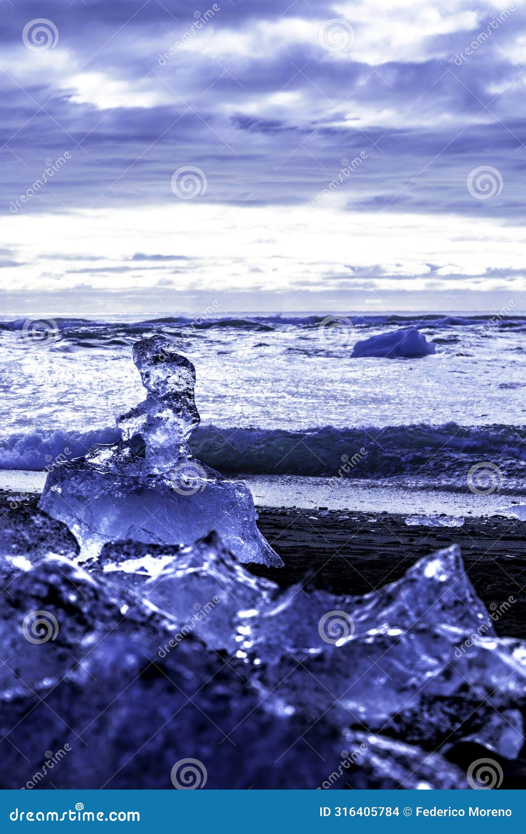 A Blue Ocean with Ice Floating on it Stock Photo - Image of crystal ...