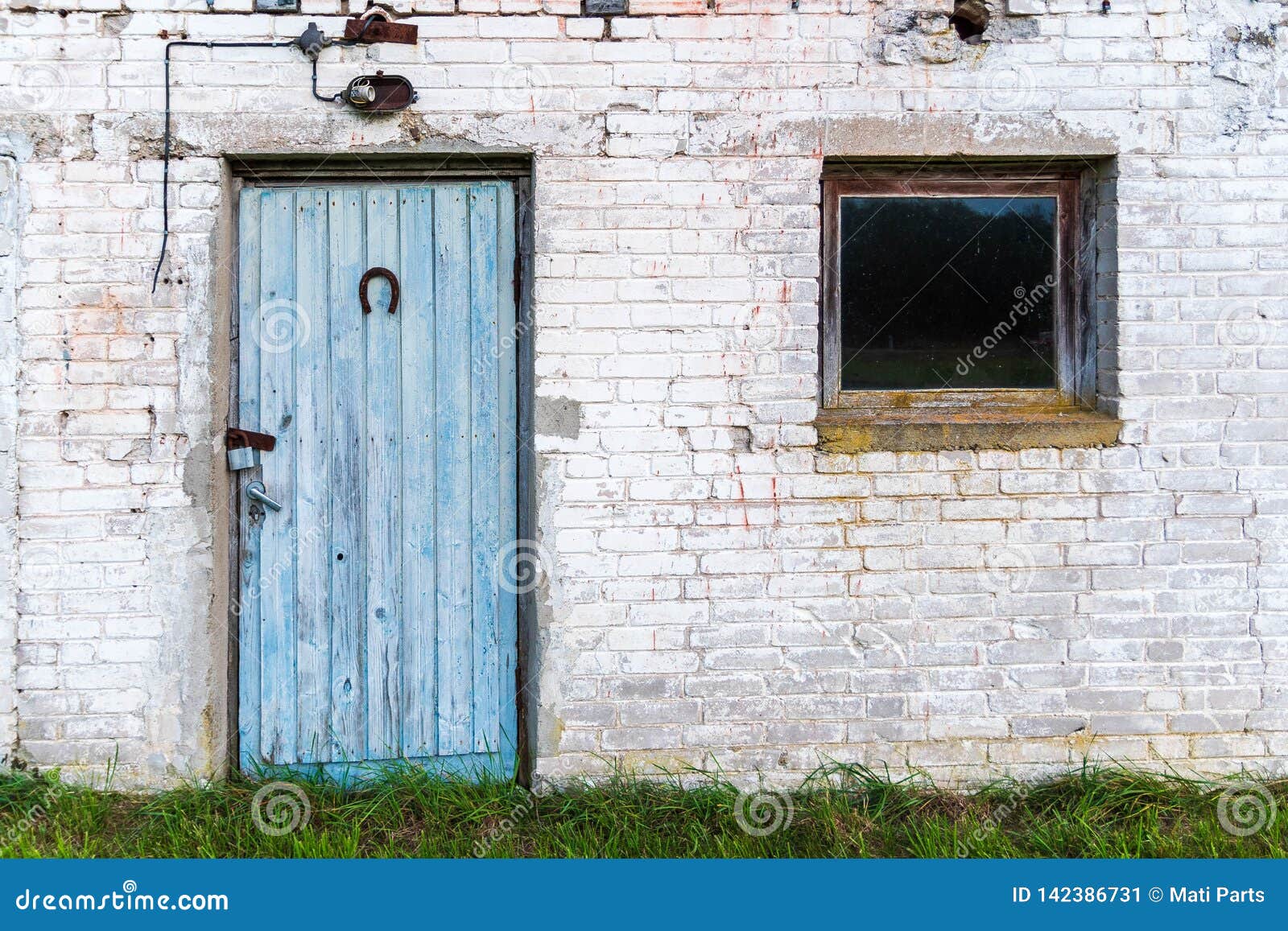 Blue Old Door and Small Window of a Soviet-era Barn Stock Image - Image ...