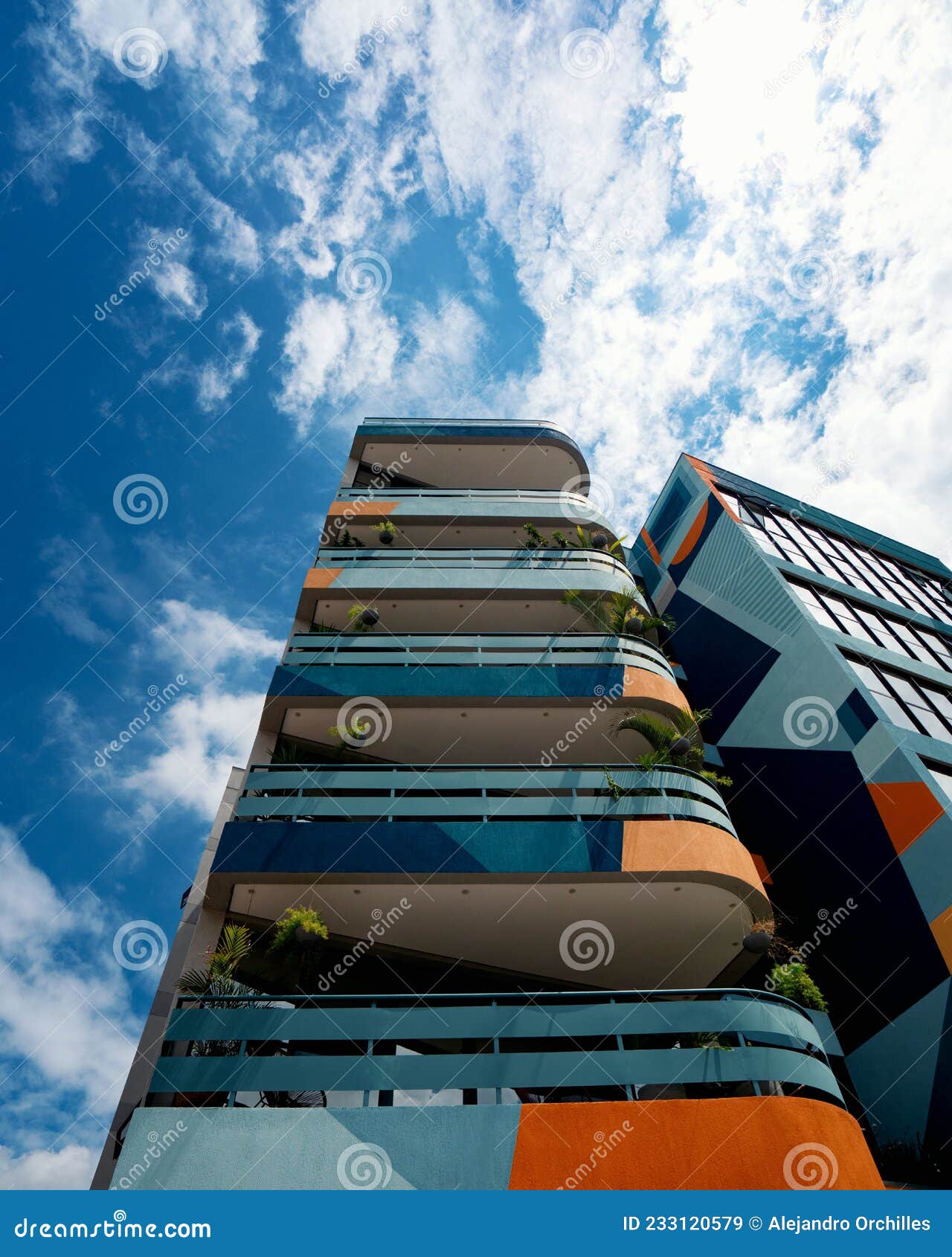 Blue and Orange Building with Beautiful and Sunny Blue Sky in the ...