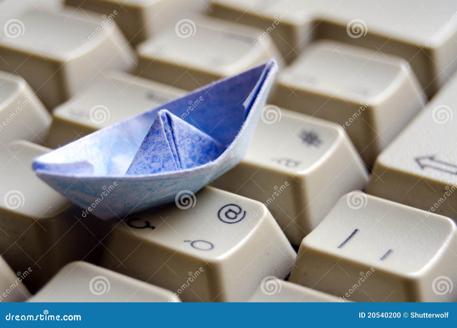Blue Origami Boat on Keyboard Stock Photo - Image of origami ...