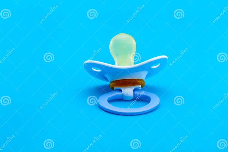 A Blue Pacifier Made of Soft Silicone. Stock Photo - Image of dummy ...