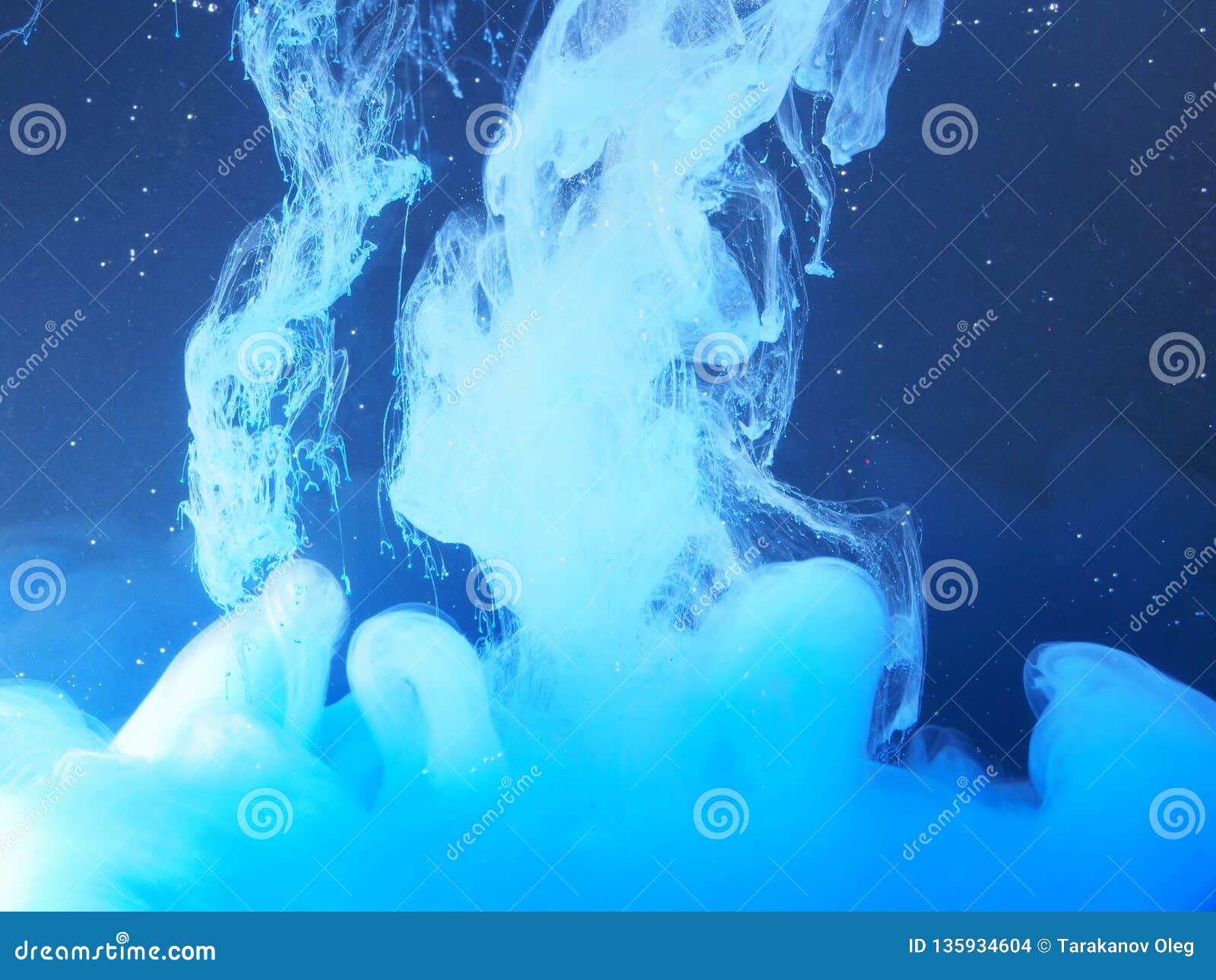 Blue Paint is Mixed with Water. the Dissolution of Ink in Water Stock ...