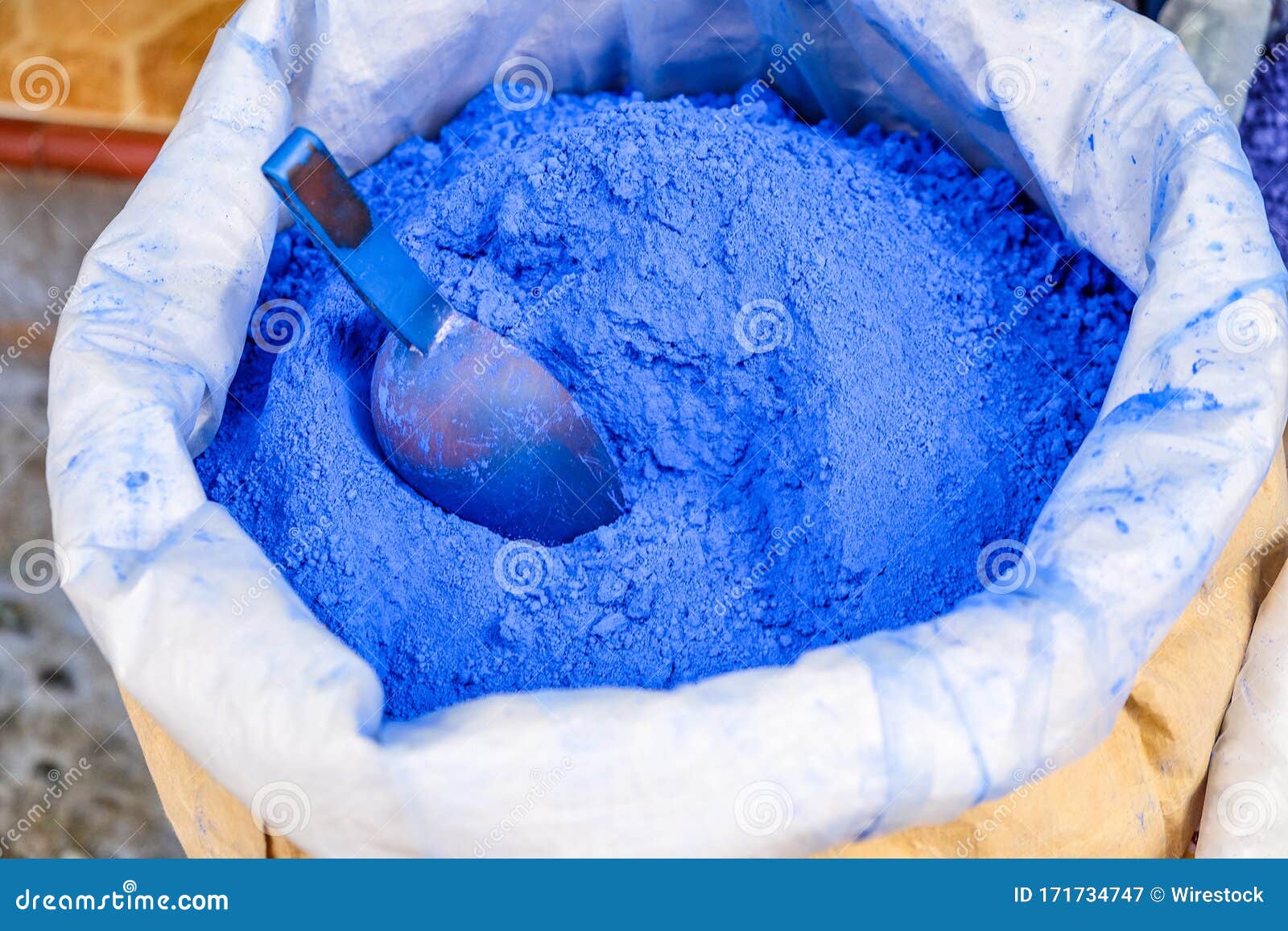 Blue Paint Powder in a Sack Under the Sunlight with a Blurry Background ...