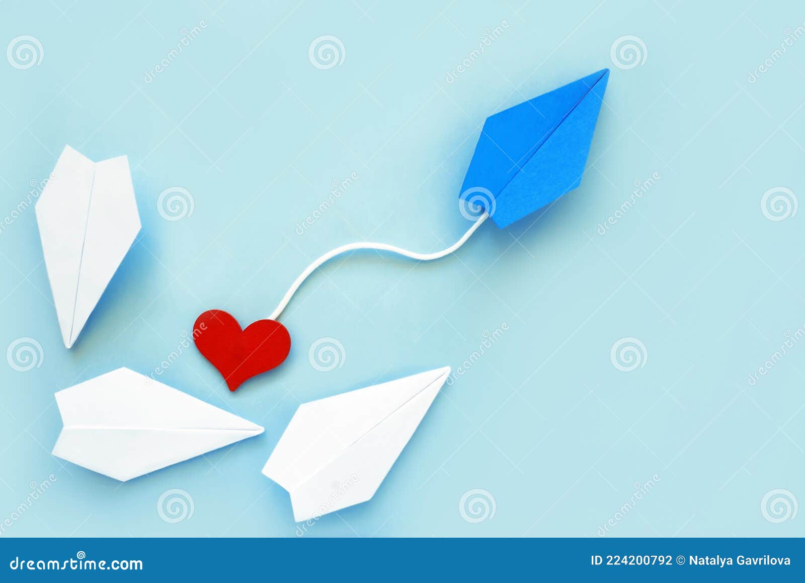 Blue Paper Airplane with a Heart and White Airplanes, on a Blue ...