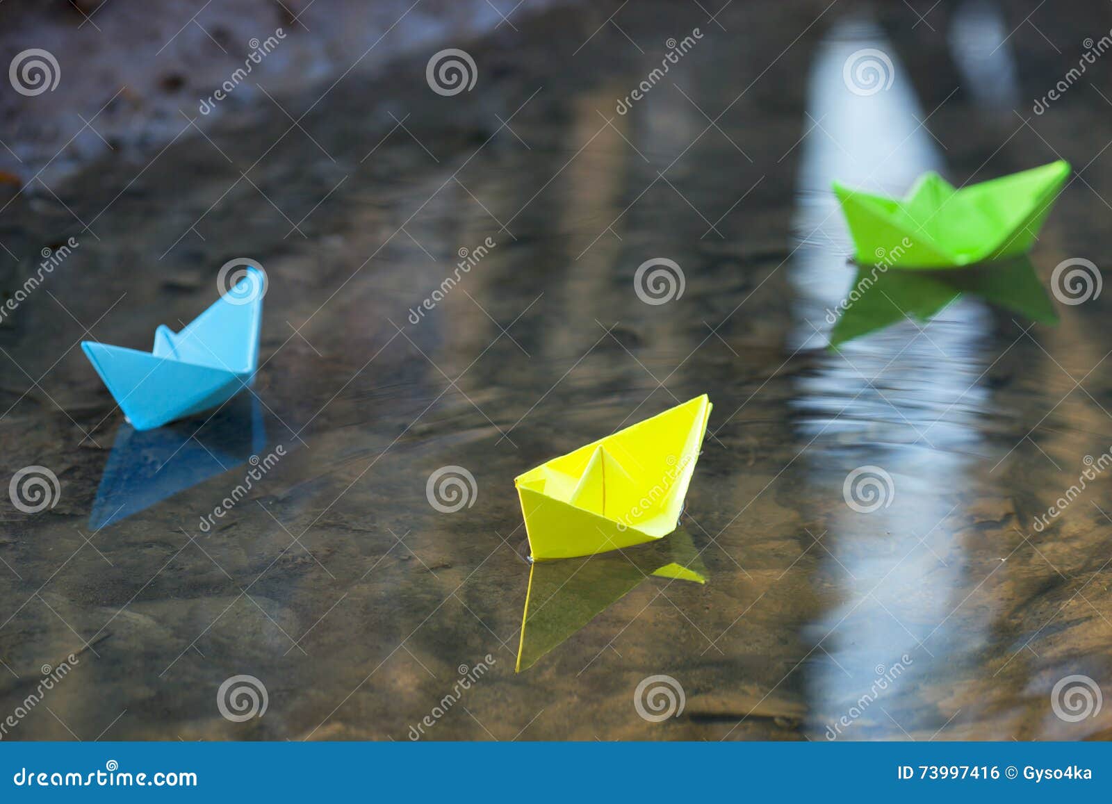 Blue paper boat in water stock photo. Image of paper - 73997416