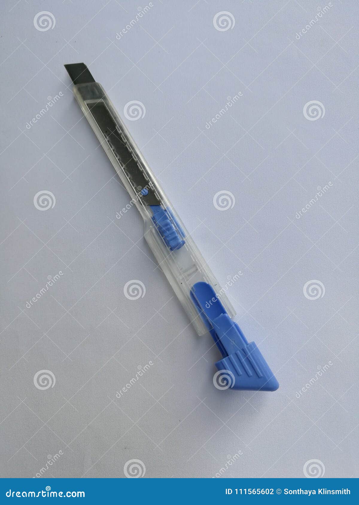 Blue paper cutter stock photo. Image of razor, plastic - 111565602