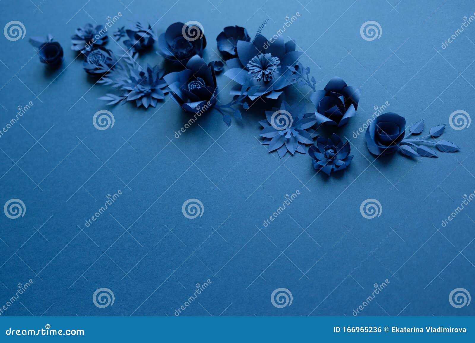Blue Paper Flowers on Blue Background. Cut from Paper Stock Photo ...