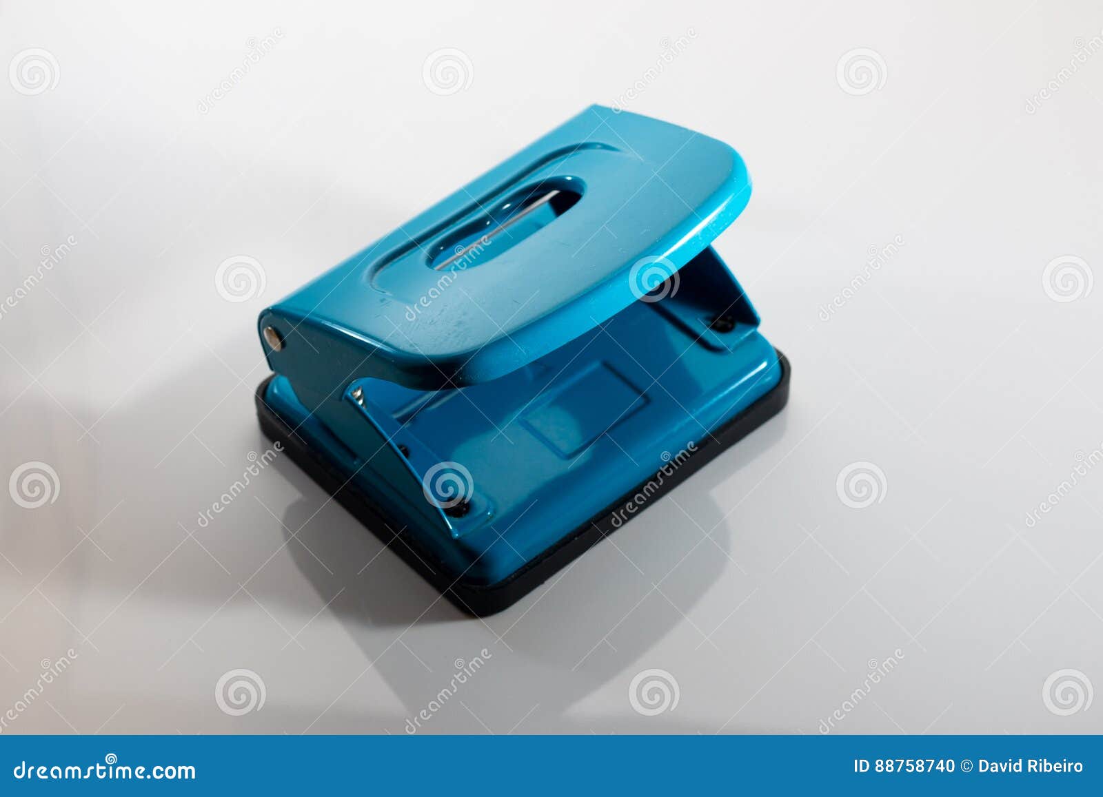 Blue paper punch stock photo. Image of frame, punch, metallic - 88758740