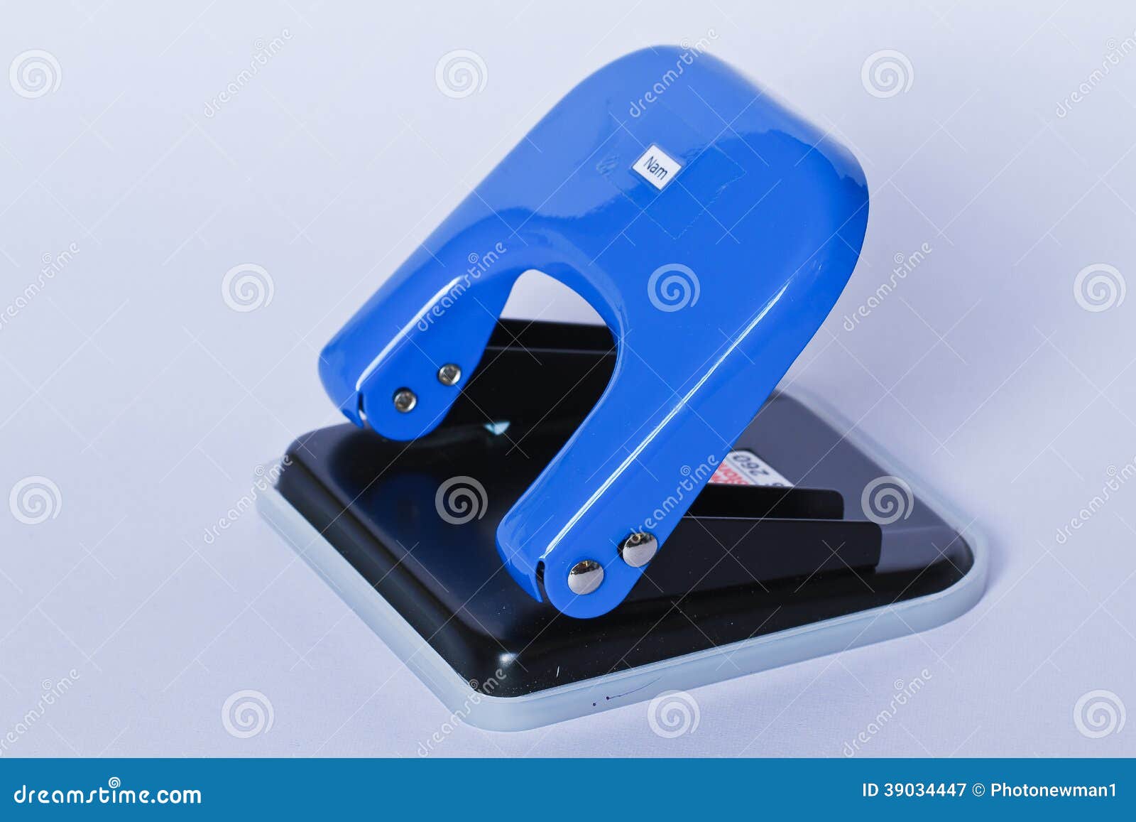 Blue Paper Puncher stock image. Image of punches, white - 39034447