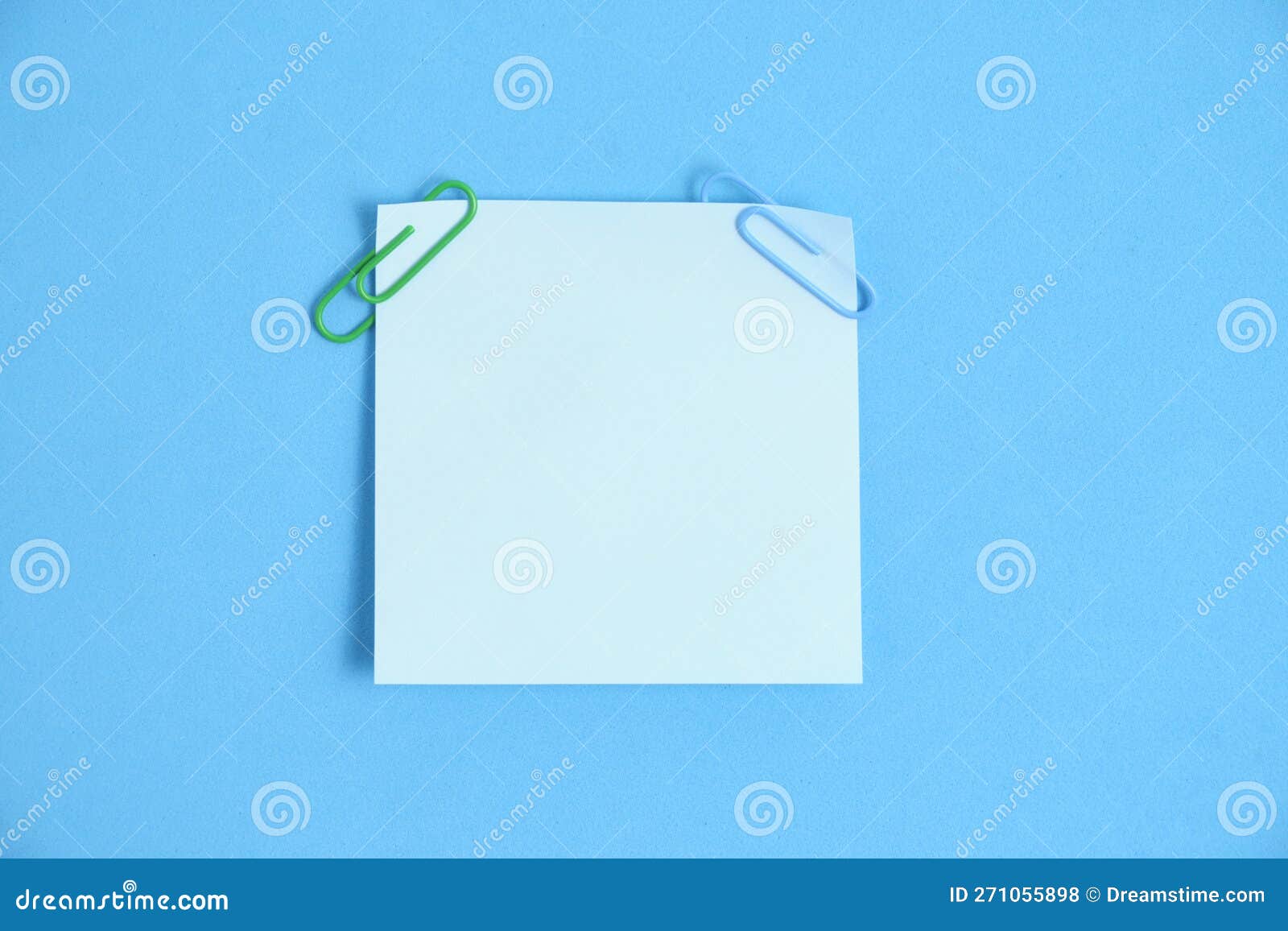 Blue Paper Stickers for Writing Notes on a Blue Background. Stock Photo ...